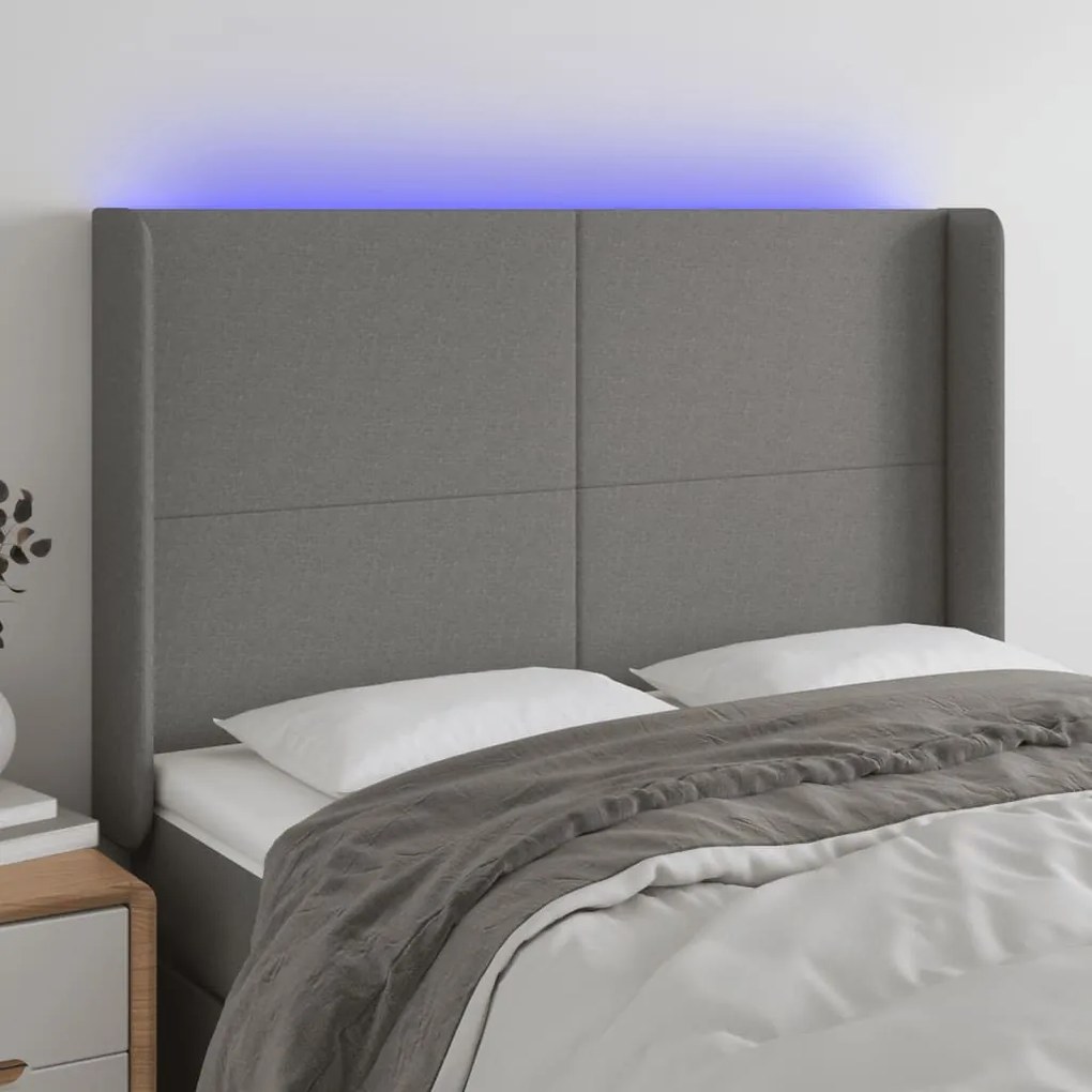 Čelo postele s LED tmavě šedé 147 x 16 x 118/128 cm textil 3123767