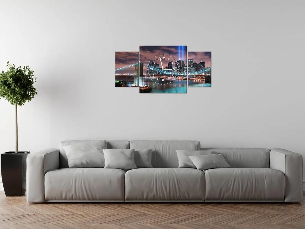 Gario Obraz s hodinami Panorama Manhattanu - 3 dílný Rozměry: 90 x 70 cm