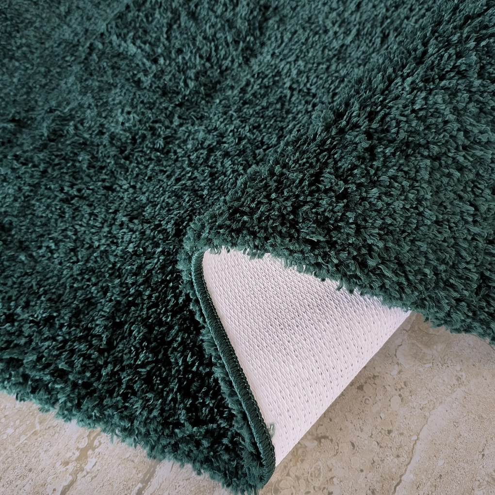 DY Tmavě zelený protiskluzový koberec shaggy Camel Rozměr: 60x100 cm