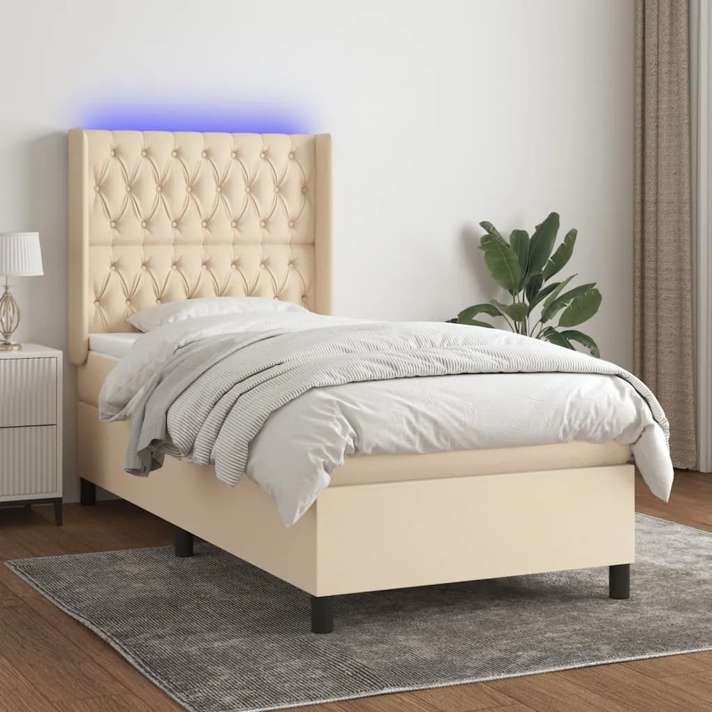 Box spring postel s matrací a LED krémová 90x190 cm textil