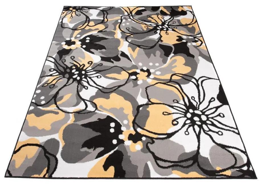 Kusový koberec PP Velké květy žlutý 130x190cm
