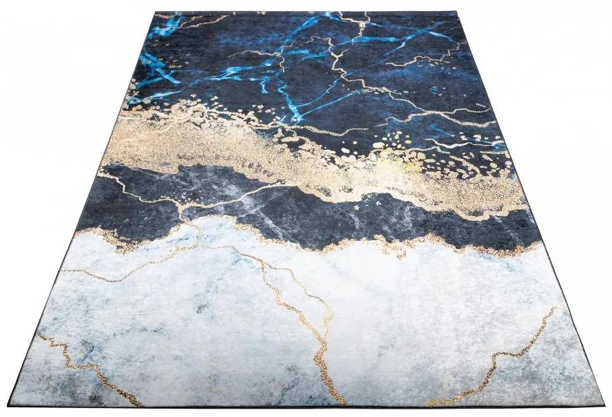 Modrý módní koberec s abstraktním vzorem Šířka: 80 cm | Délka: 150 cm