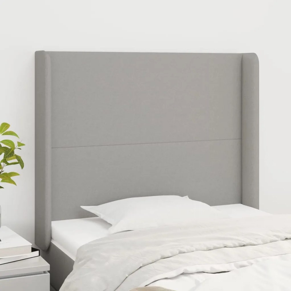 Čelo postele typu ušák světle šedé 83x16x118/128 cm textil 3119274