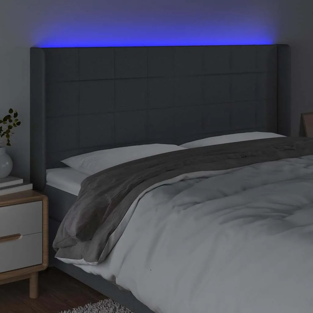 Čelo postele s LED tmavě šedé 183 x 16 x 118/128 cm textil 3124063