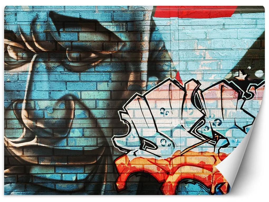 Gario Fototapeta Graffiti na zdi, modrá tvář Materiál: Vliesová, Rozměry: 200 x 140 cm