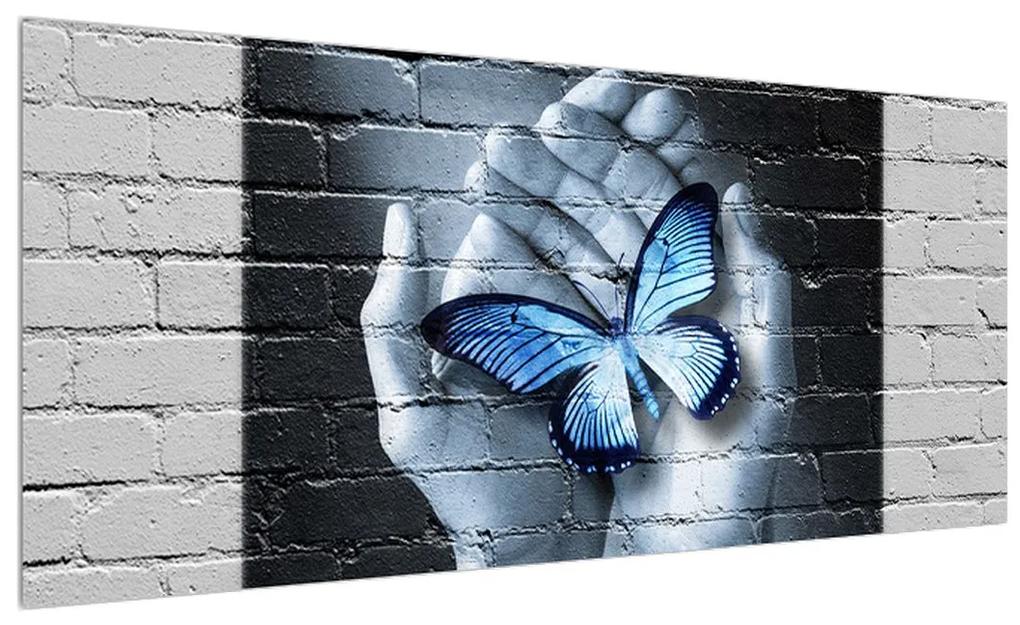 Moderní obraz dlaní s motýlem (100x40 cm)