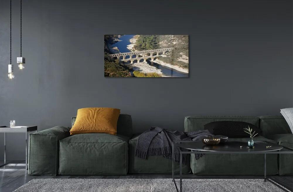 Obraz na skle řeka Řím Akvadukty 140x70 cm
