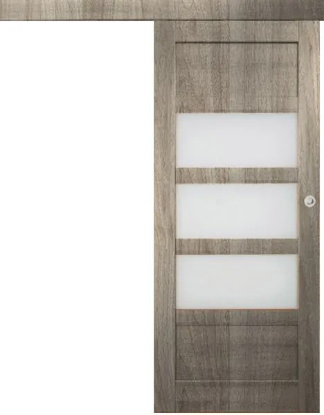 posuvné interiérové dveře na stěnu vasco doors BRAGA model B Průchozí rozměr: 70 x 197 cm, Orientace dveří: Levé dveře, Dekor: Dub riviera