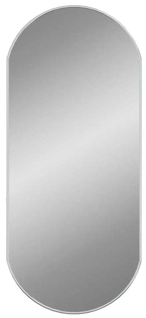 Nástěnné zrcadlo stříbrné 80x35 cm oválné