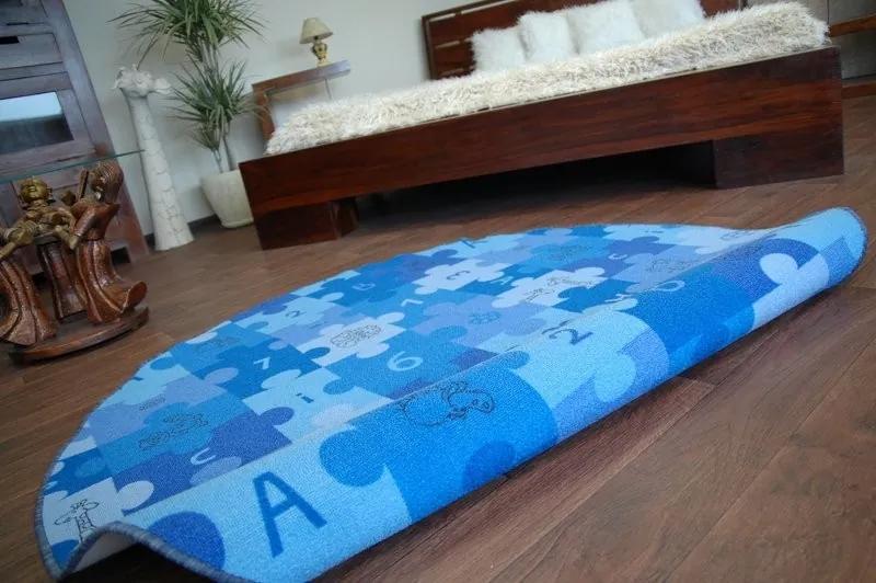 Dětský kulatý koberec PUZZLE modrý