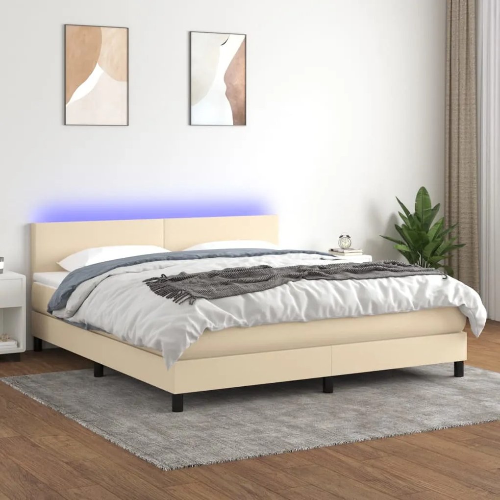 Box spring postel s matrací a LED krémová 180x200 cm textil