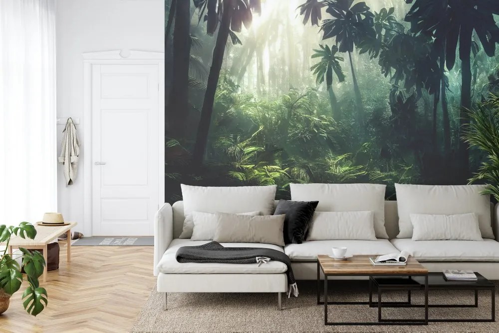 Fototapeta Dark Rainforest, Sun Rays Through The Trees, Rich Jungle Greenery. Atmospheric Fantasy Forest. 3D . Hladký vinyl 104x70.5