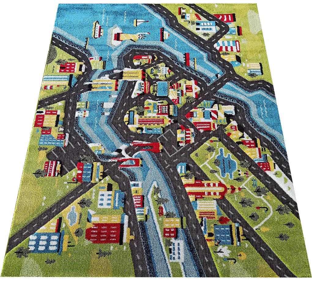 Dětský kusový koberec Uličky Color Kids 03 Ceta Domy Řeka Lodě zelený modrý Rozměr: 200x290 cm