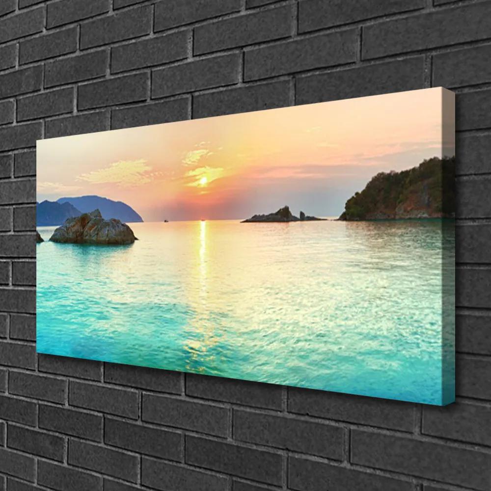 Obraz na plátně Slunce Skály Moře Krajina 140x70 cm
