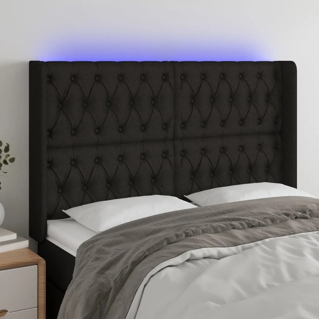Čelo postele s LED černé 147 x 16 x 118/128 cm textil 3124384