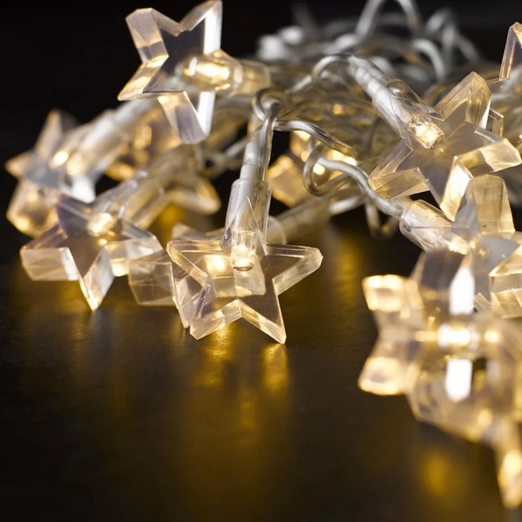 LED dekorativní řetěz hvězdičky, 10,5 m, teple bílá, 70 diod, čirý kabel, IP20 interiér, prodlužovací