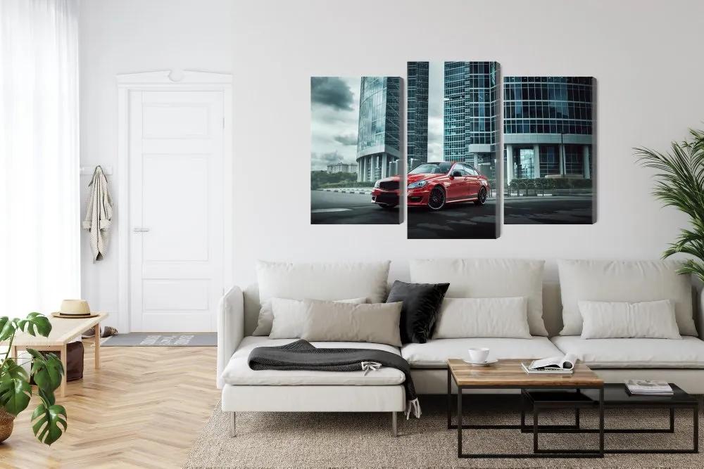 Vícedílný obraz Červené Auto Na Pozadí Moderních Mrakodrapů Nedostatek Nedostatek Přírodní plátno 90x60
