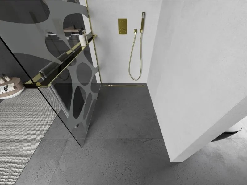 Mexen Kioto+ L, sprchová zástěna Walk-In s poličkou a věšákem 110 x 200 cm, 8mm čiré sklo bílý vzor, zlatý lesklý profil, 800-110-123-50-97
