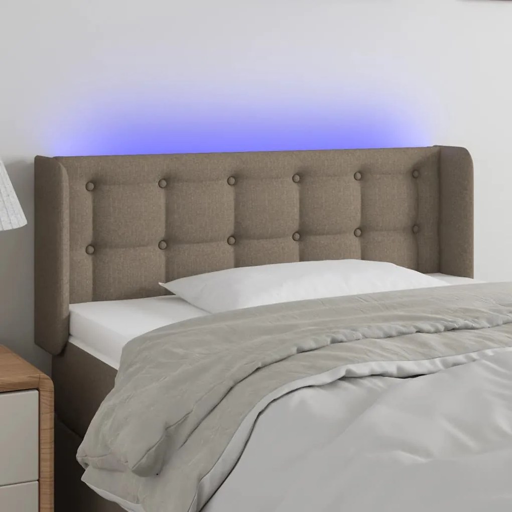 Čelo postele s LED taupe 103 x 16 x 78/88 cm textil