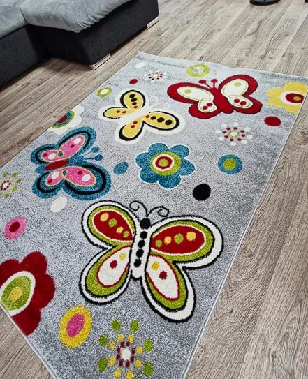 HU Vícebarevný dětský koberec Kids Motýli 581 L.grey šedý Rozměr: 60x100 cm