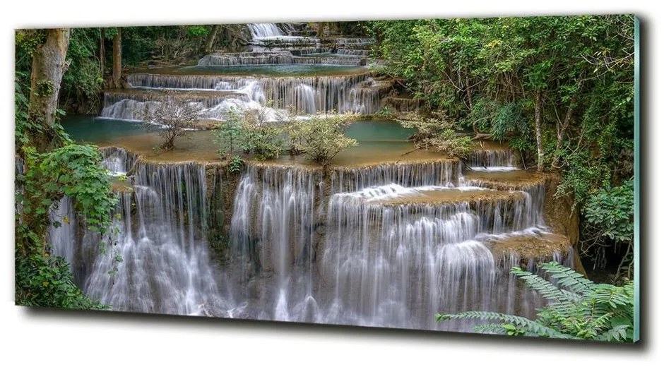 Wallmuralia Foto obraz fotografie na skle Vodopád v lese 125x50 cm