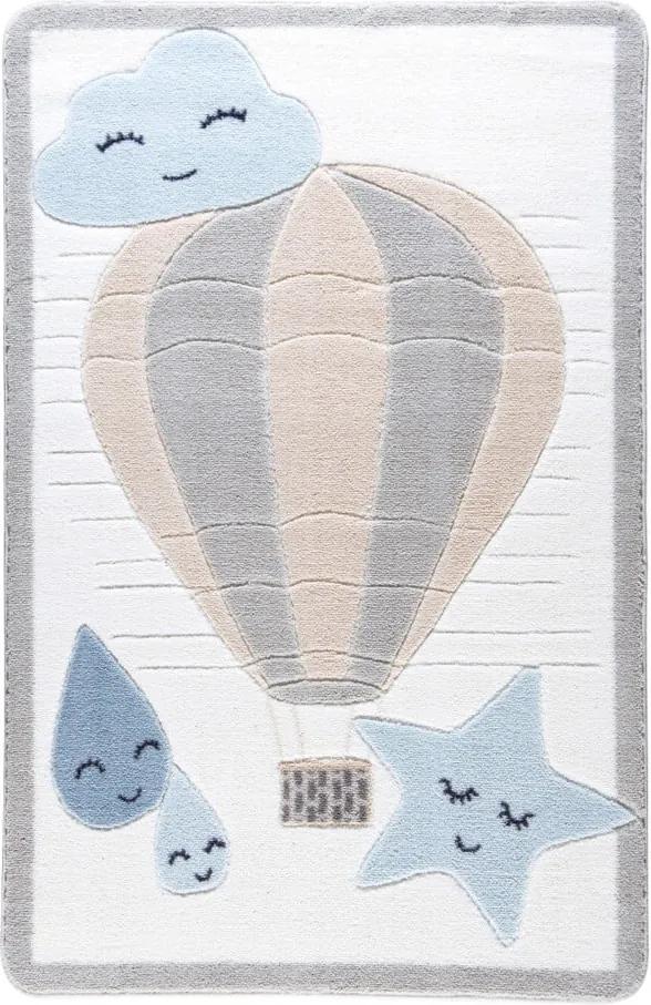 Dětský světle modrý koberec Confetti Cloudy, 133 x 190 cm