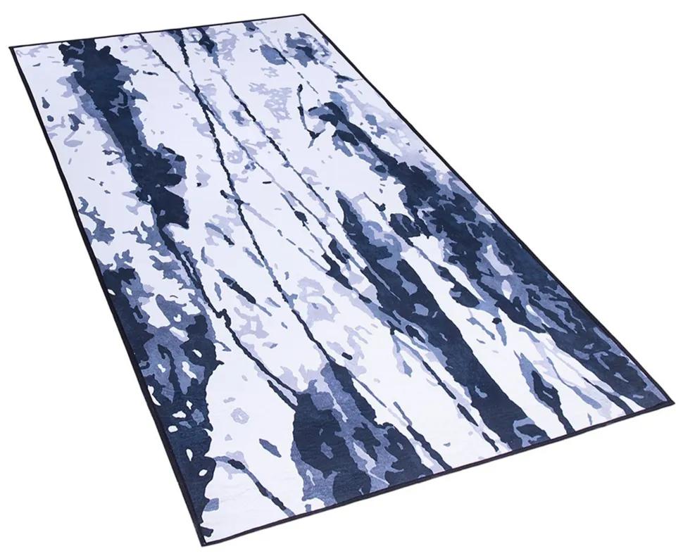 Krátkovlasý bílý koberec s abstraktním modrým vzorem 80 x 150 cm IZMIT