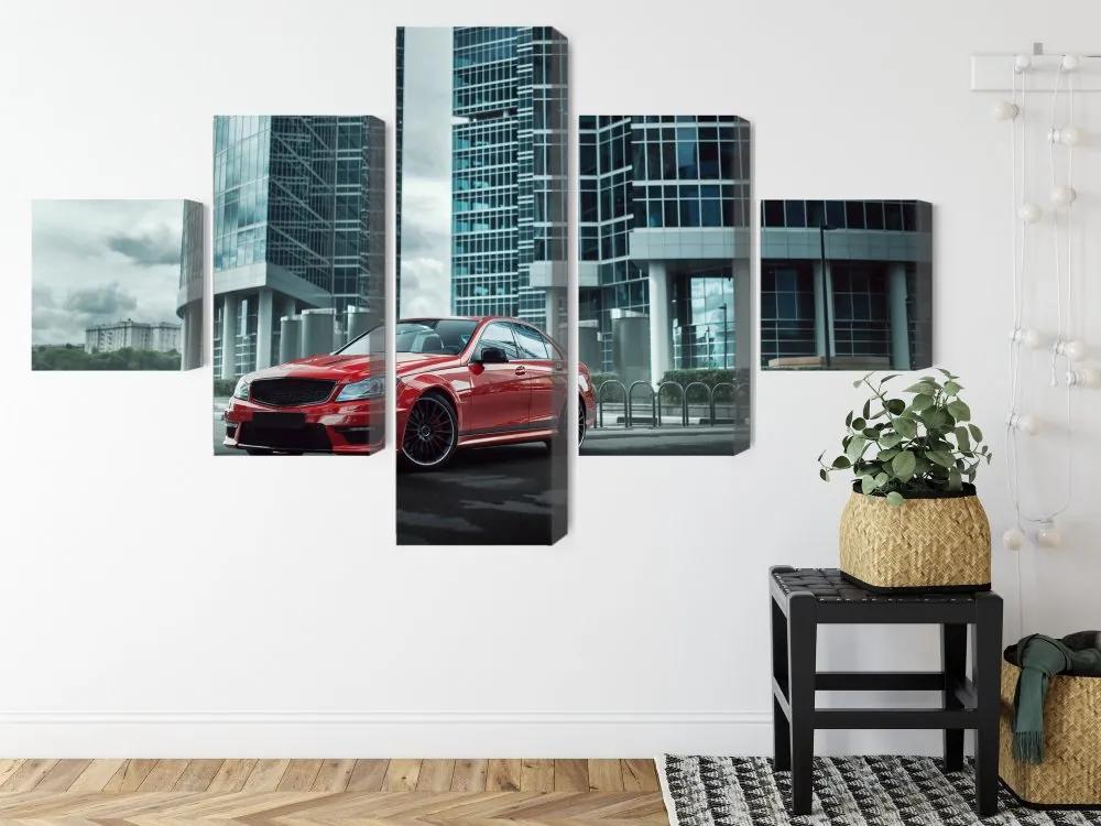 Vícedílný obraz Červené Auto Na Pozadí Moderních Mrakodrapů Nedostatek Nedostatek Plátno Canvas 150x90