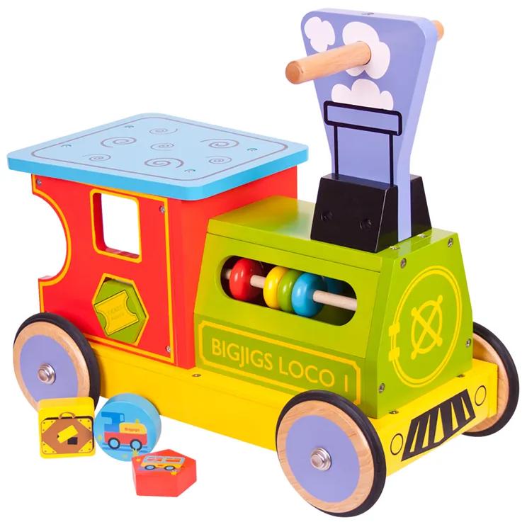 Bigjigs Toys Dřevěný motorický vozík Mašinka