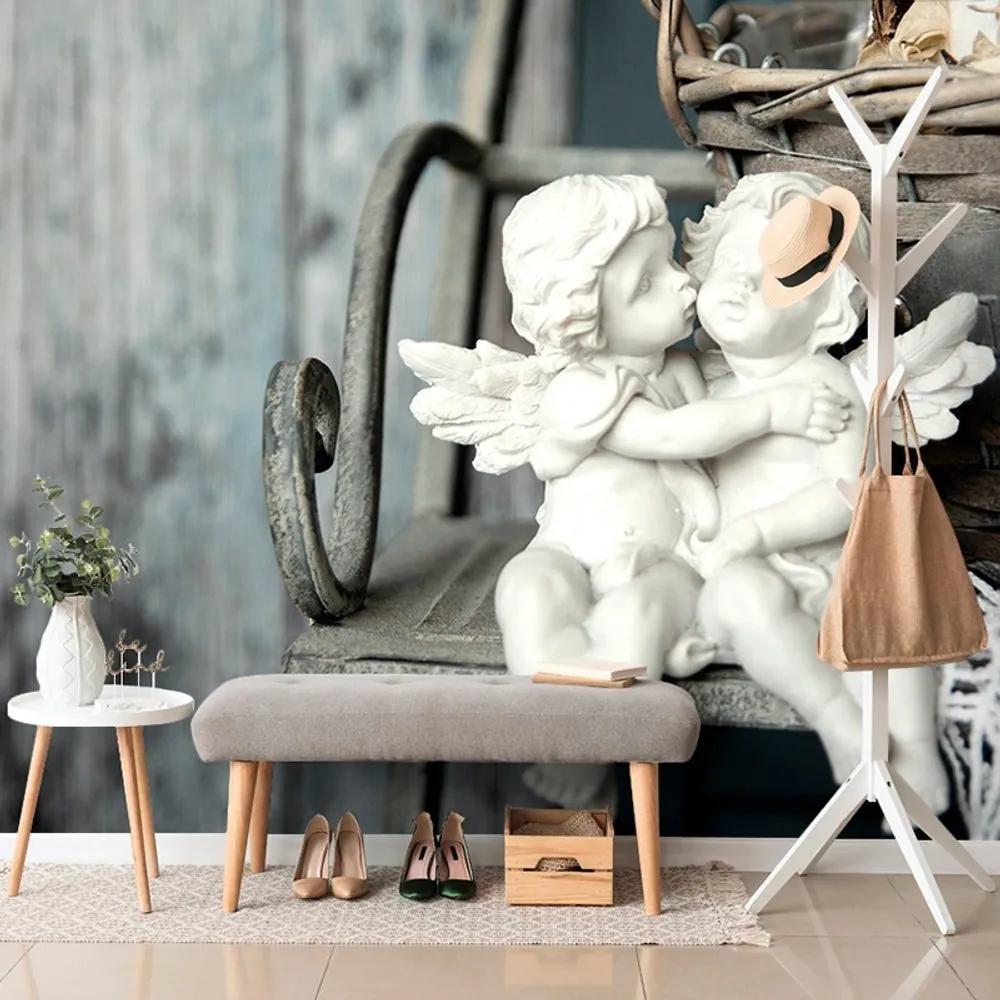 Samolepící fototapeta sošky andílků na lavičce - 450x300 cm