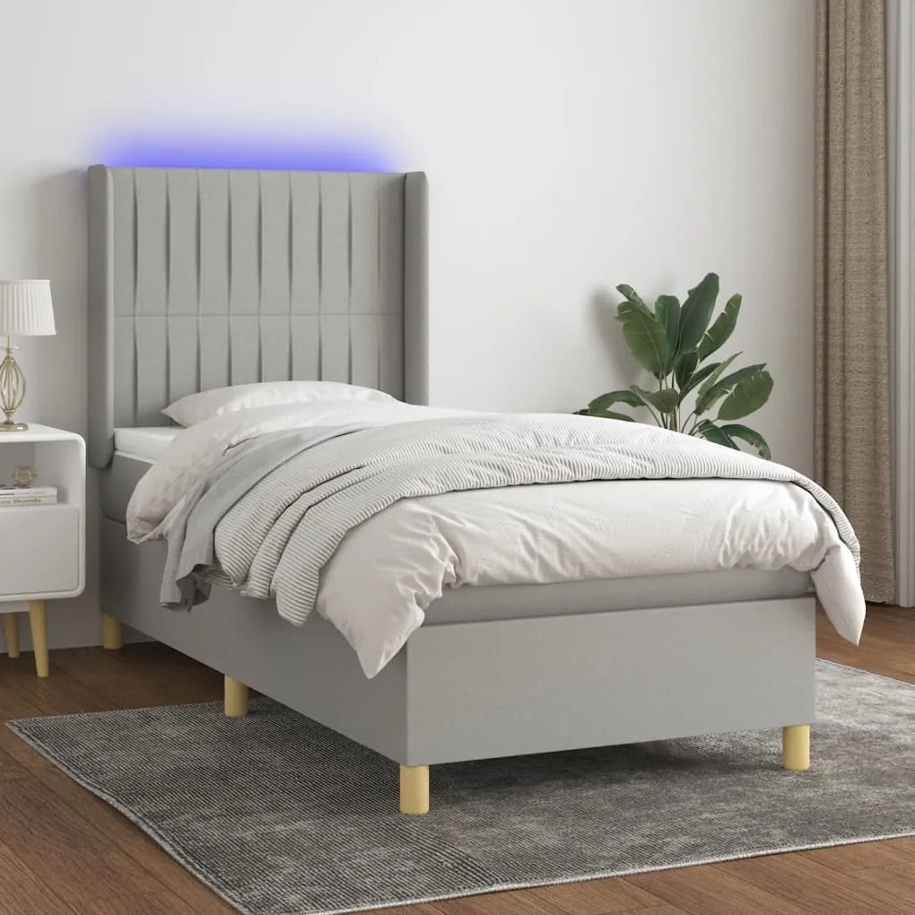Box spring postel s matrací a LED světle šedá 90x200 cm textil