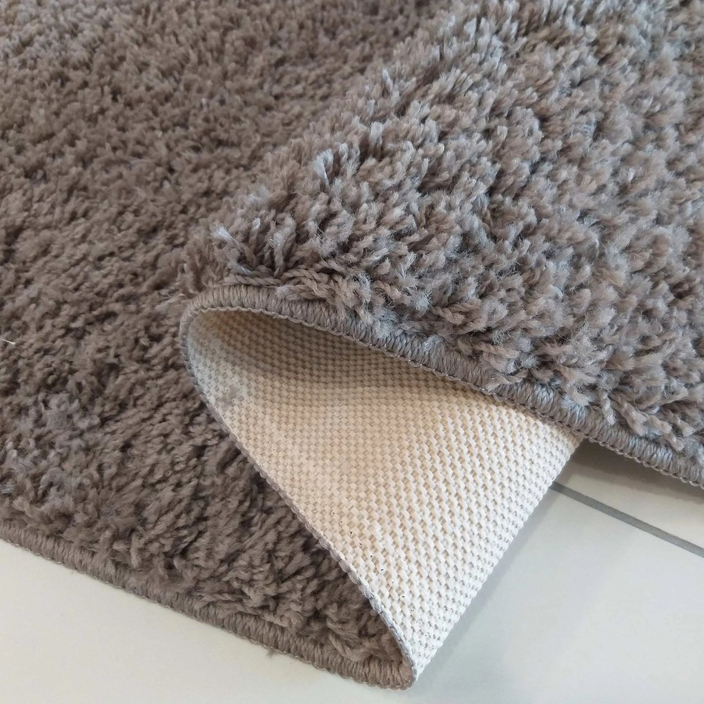 DY Hnědý neklouzavý koberec shaggy Camel Rozměr: 60x100 cm