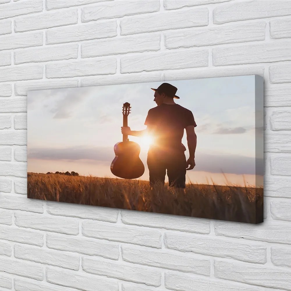 Obrazy na plátně kytara muž 100x50 cm