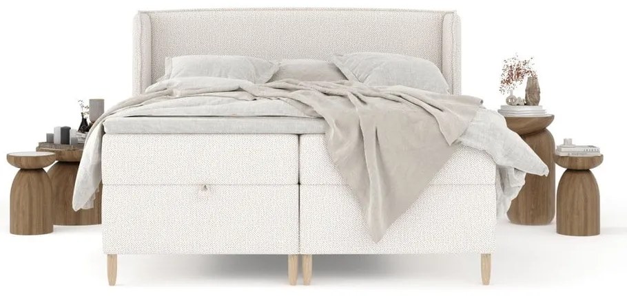 Krémová boxspring postel s úložným prostorem 160x200 cm Monpelli – Maison de Rêve