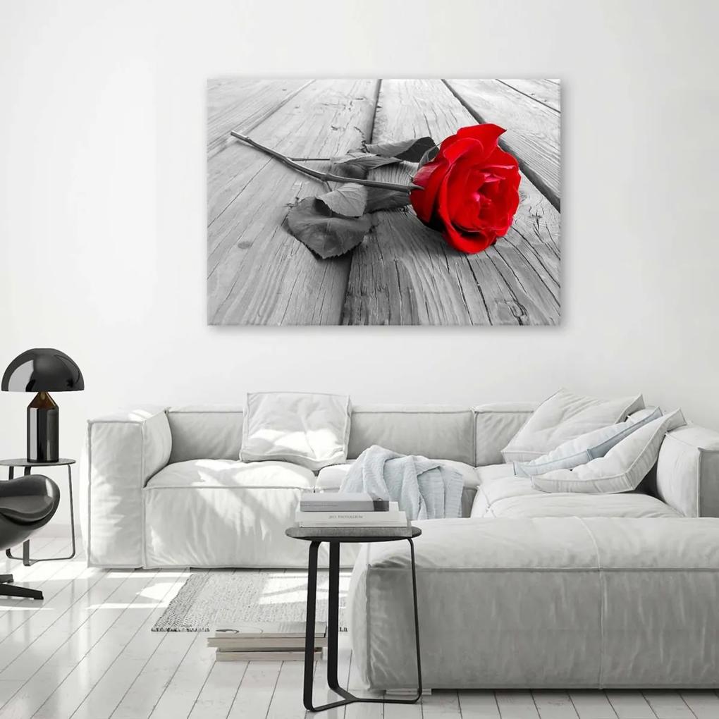 Obraz na plátně Červená růže na podlahových prknech - 120x80 cm