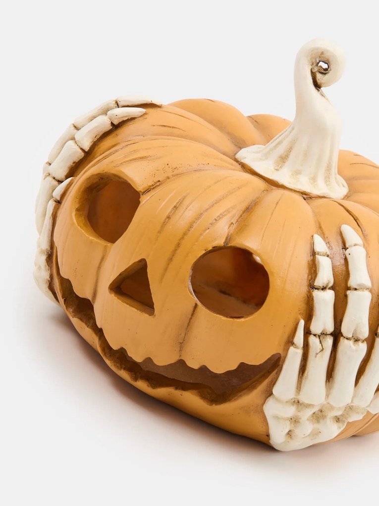 Sinsay - Halloweenský svícen na LED svíčky ve tvaru dýně s kostlivými rukama - oranžová