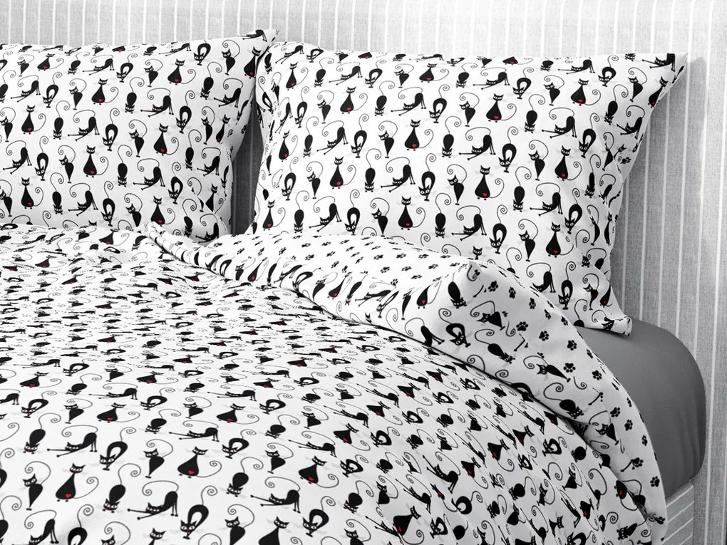 Goldea bavlněné ložní povlečení - vzor 570 černé kočky a tlapky 140 x 220 a 70 x 90 cm