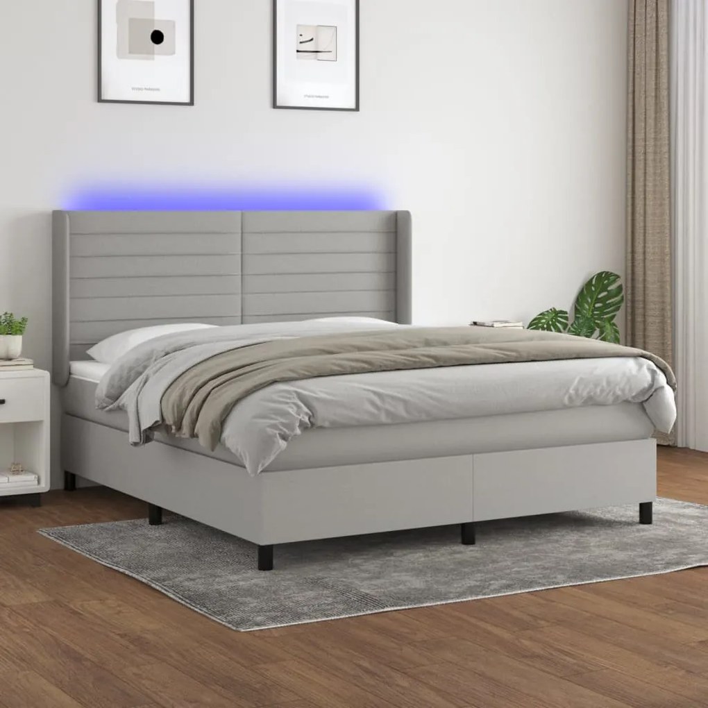 Box spring postel s matrací a LED světle šedá 160x200 cm textil