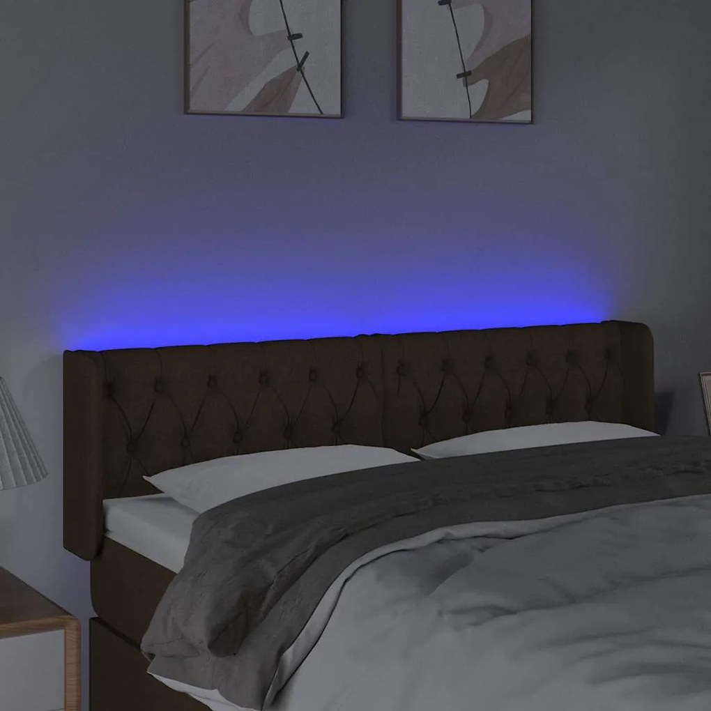 Čelo postele s LED tmavě hnědé 147 x 16 x 78/88 cm textil 3123573