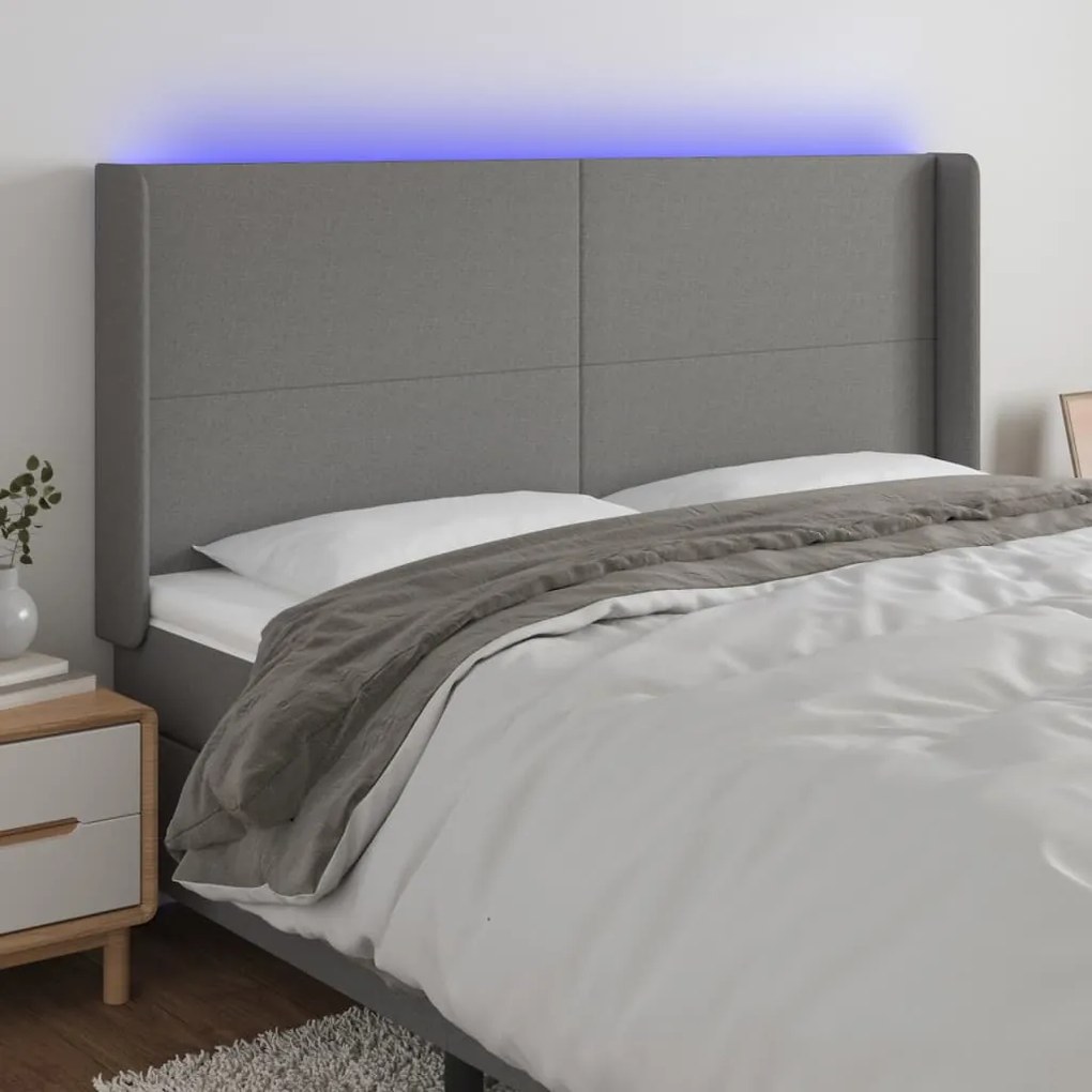 Čelo postele s LED tmavě šedé 183 x 16 x 118/128 cm textil 3123783