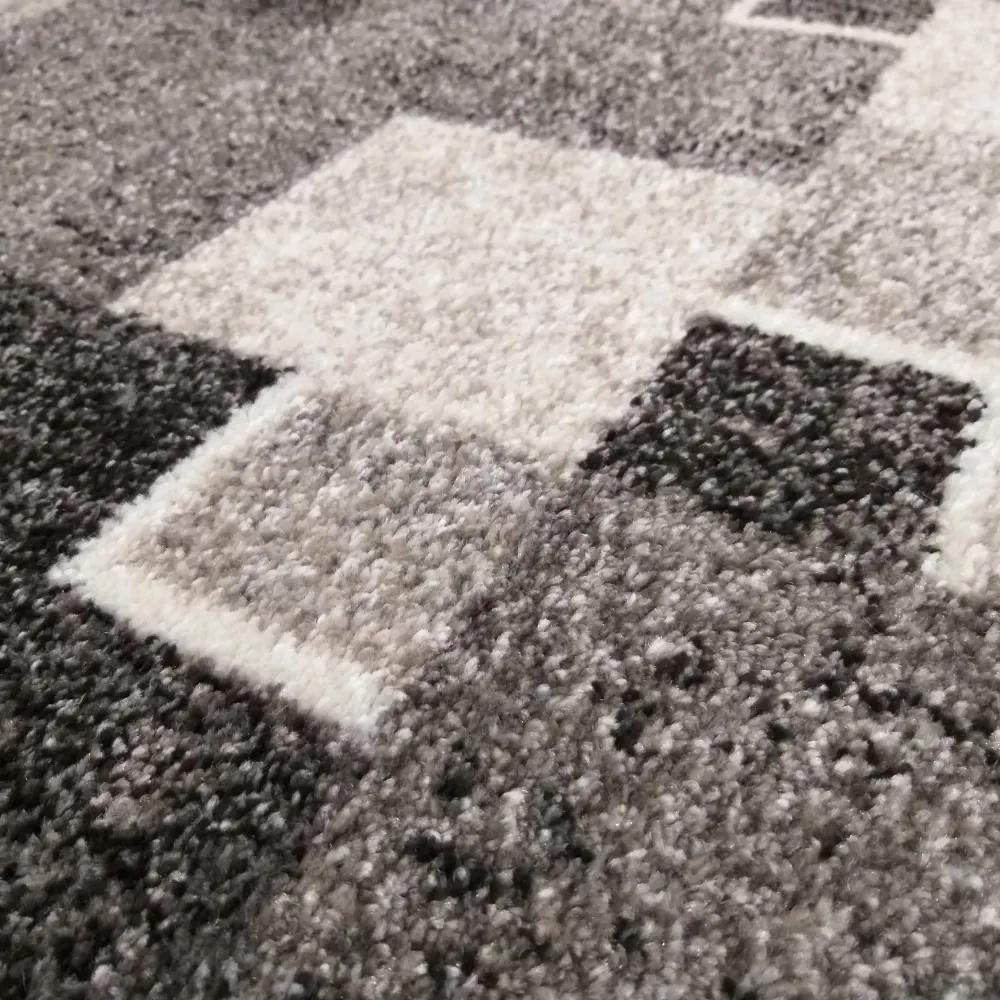 Moderní béžový koberec s motivem čtverců