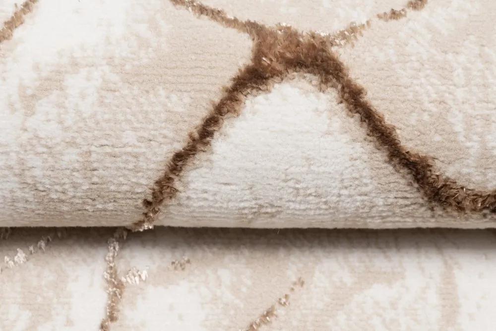 Jednoduchý moderní koberec béžový s hnědým motivem Šířka: 120 cm | Délka: 170 cm