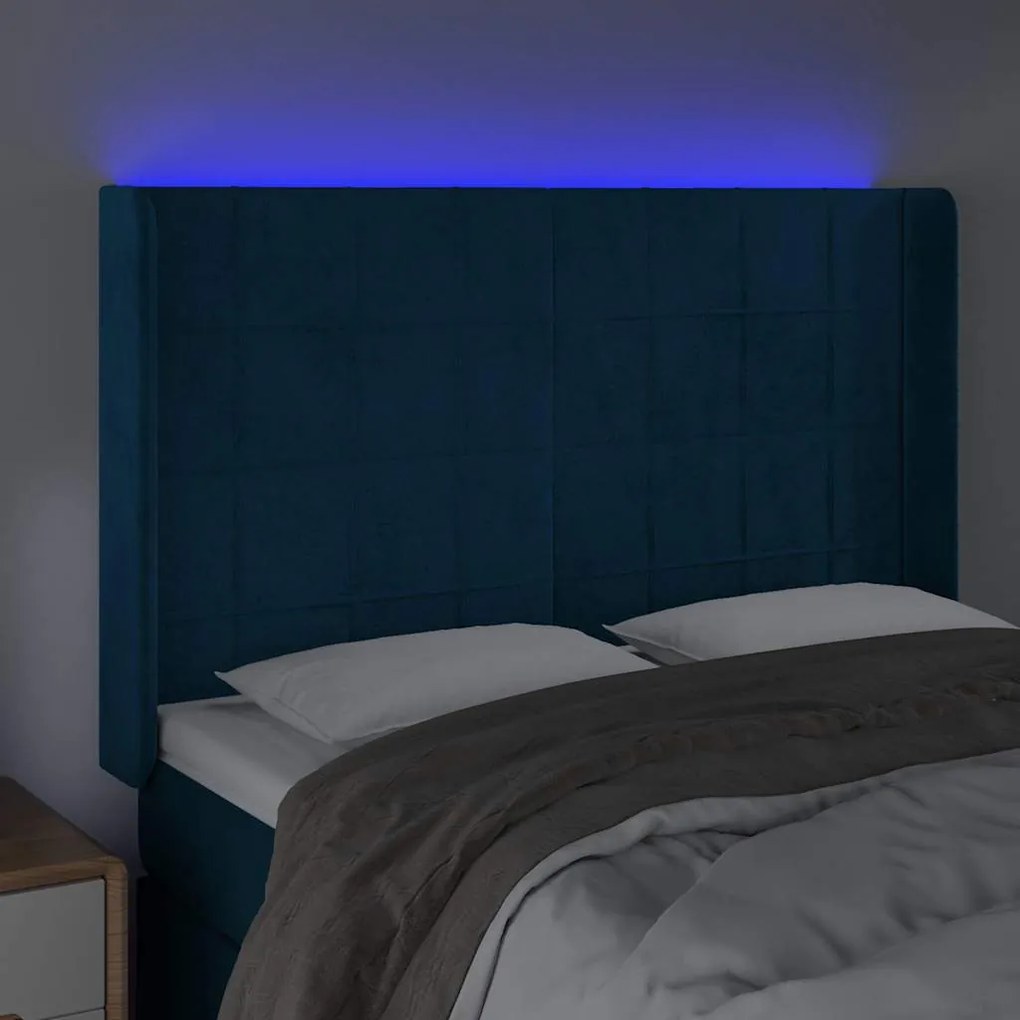 Čelo postele s LED tmavě modré 147 x 16 x 118/128 cm samet 3124100