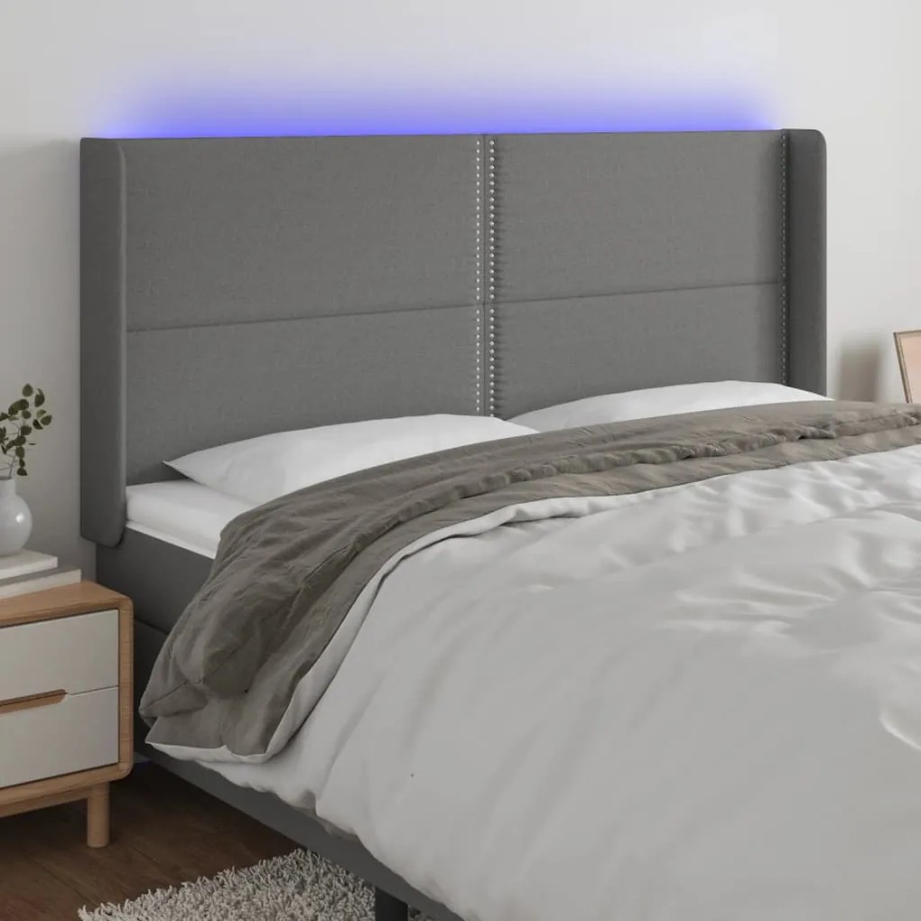 Čelo postele s LED tmavě šedé 183 x 16 x 118/128 cm textil 3123923