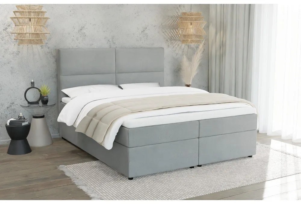 Světle šedá boxspring postel s úložným prostorem 140x200 cm Rico – Ropez