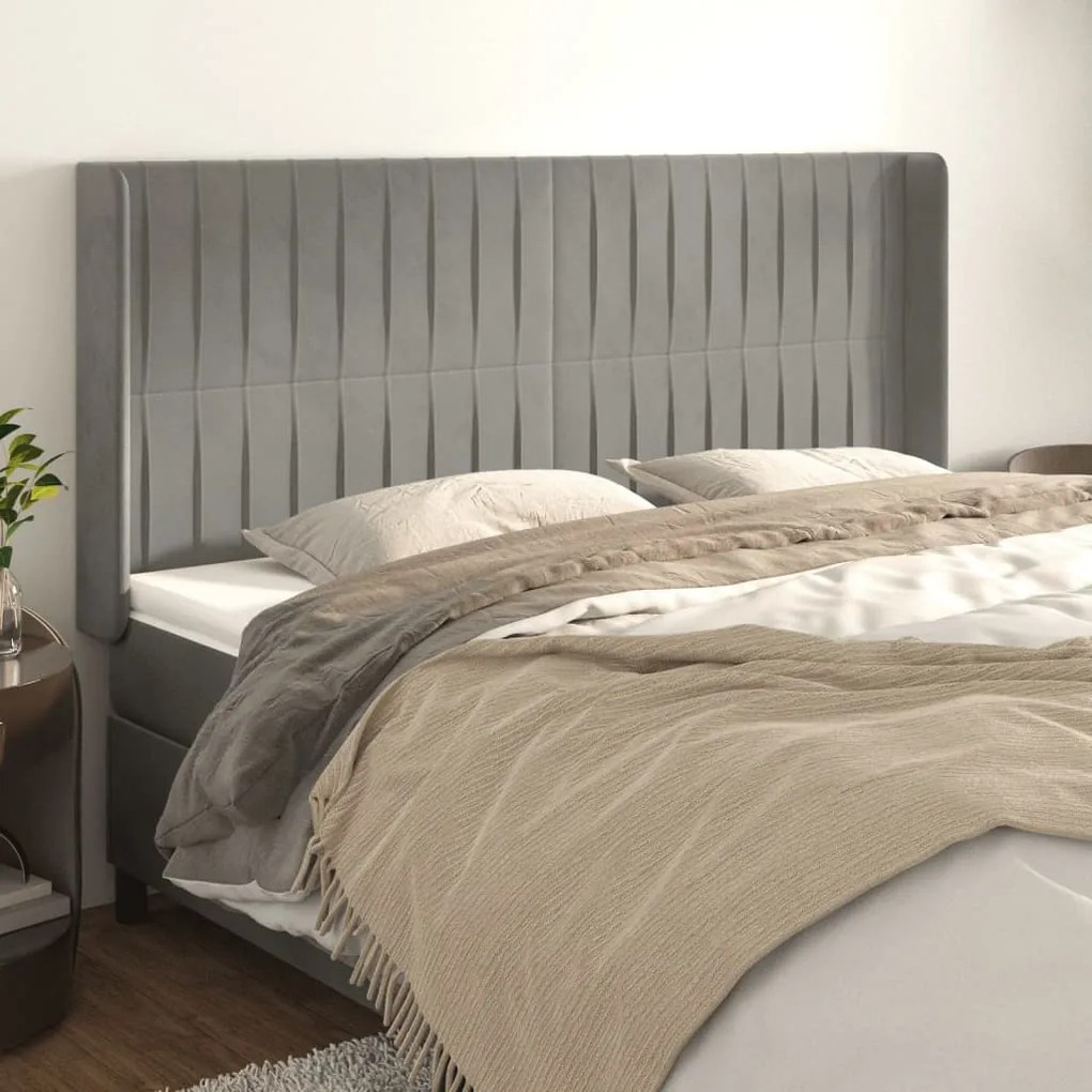 Čelo postele typu ušák světle šedé 163x16x118/128 cm samet 3119872
