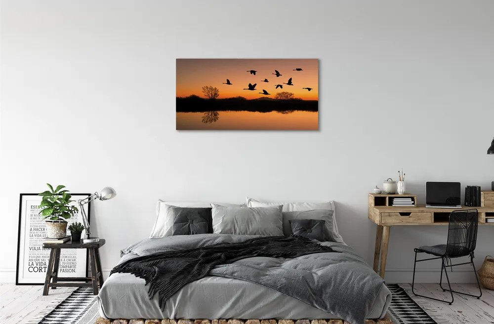 Obrazy na plátně Létající ptáky sunset 125x50 cm