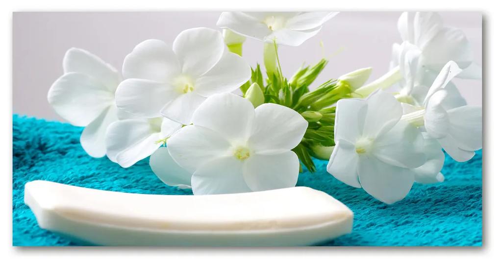 Foto obraz sklo tvrzené Bílé květiny spa