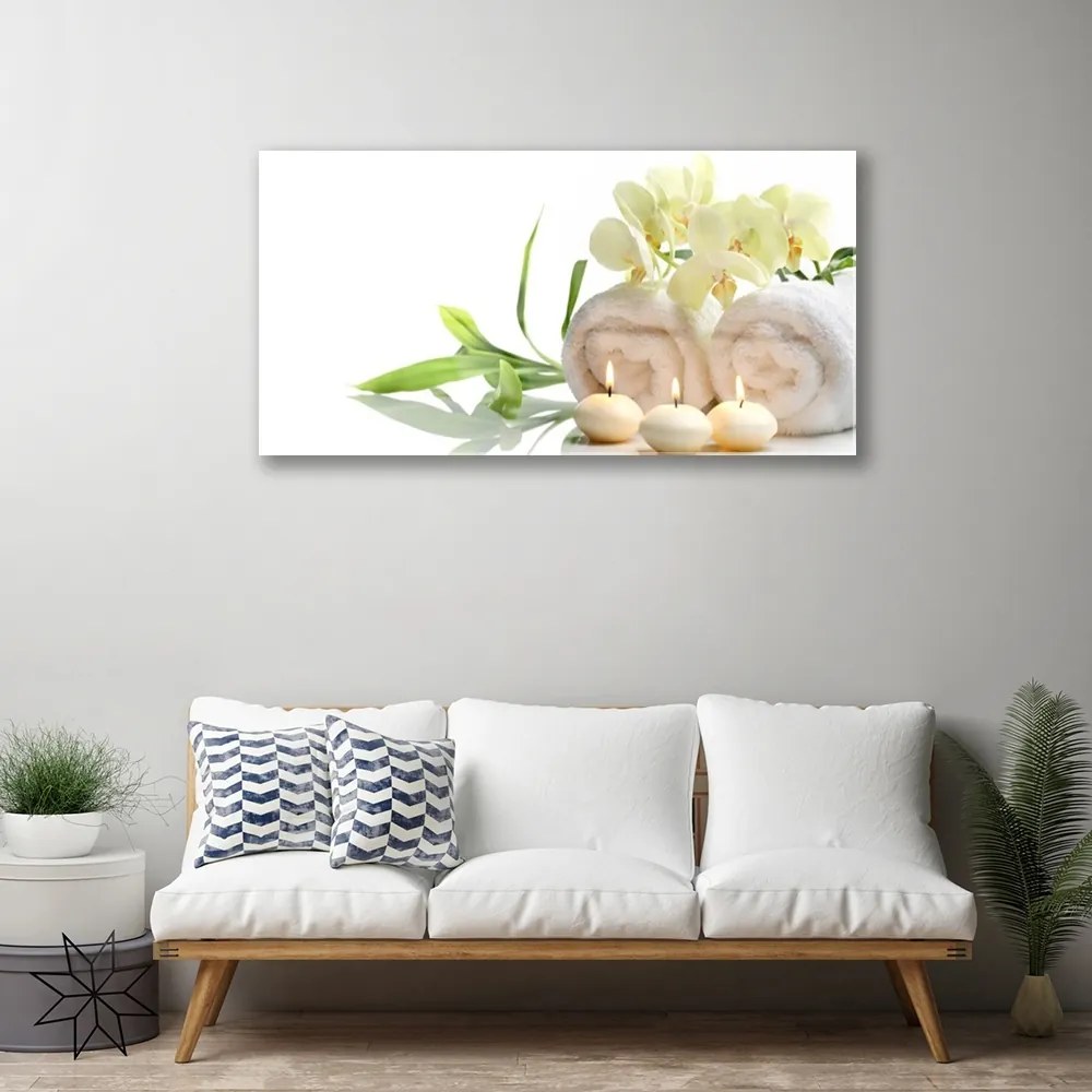 Obraz na skle Lázně Ručníky Svíce Orchidej 120x60 cm