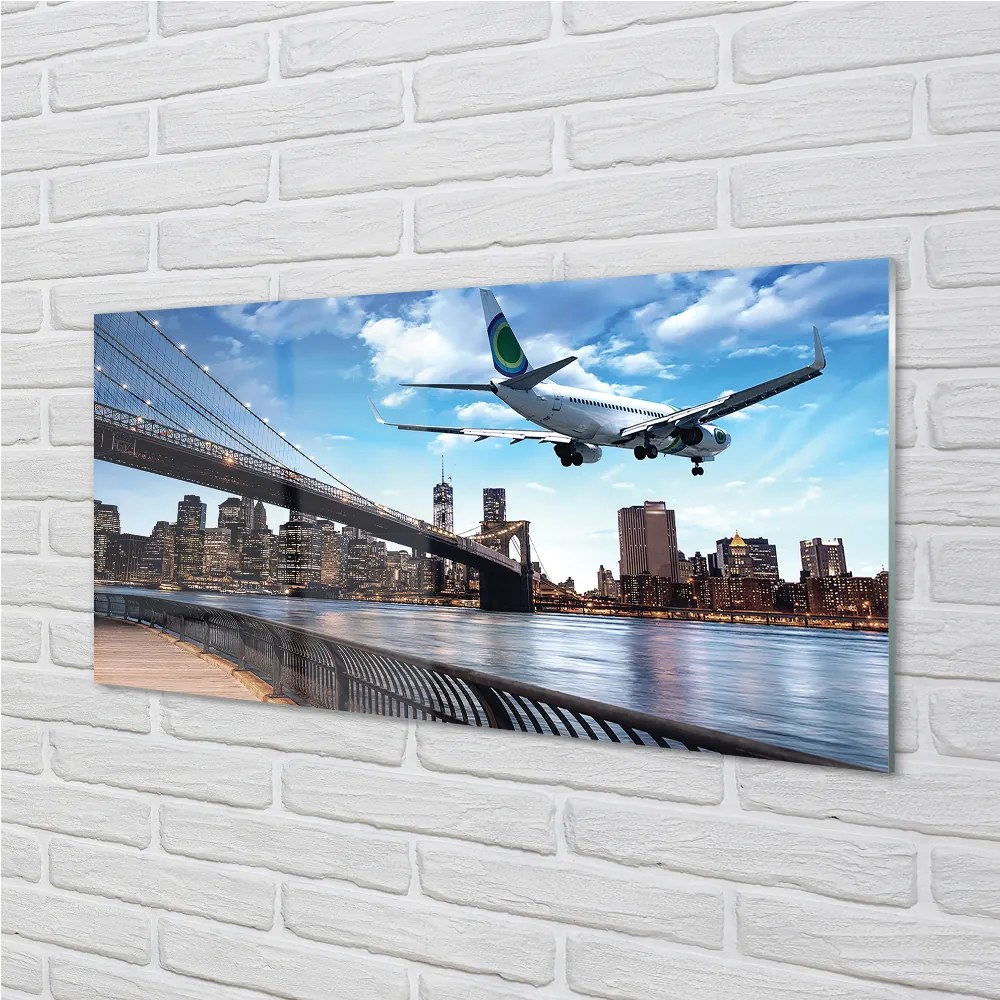 Skleněný panel Letadel mraky město 140x70 cm